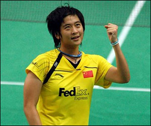 Lin Wang of China reacts after defeating Saina Nehwal by 21-16, 21-19 ...