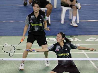 Immaterial defeat: Malaysia’s Lai Pei Jing (front) and Ng Hui Ern in ...
